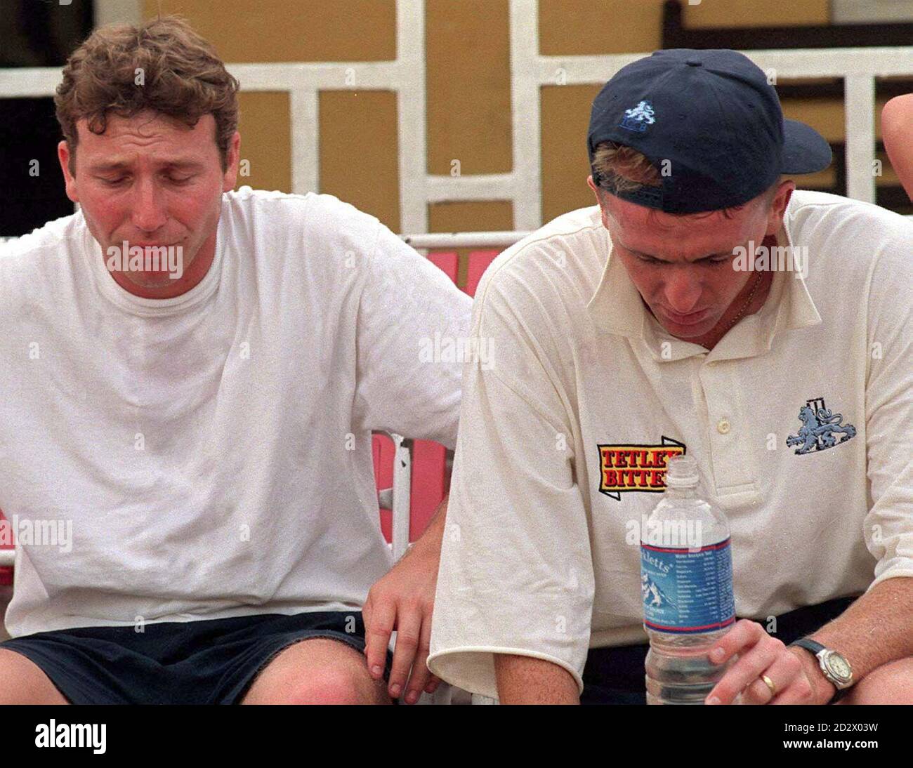 Feeling the heat, England Cricket Captain Mike Atherton (left) and ...