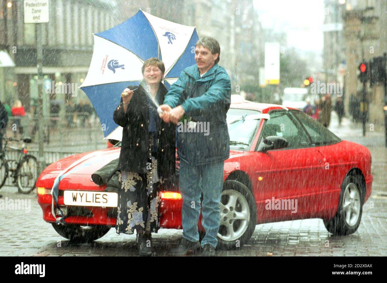 Scotland's newest Lottery millionaires Neil Gilroy and his wife Annabel ...