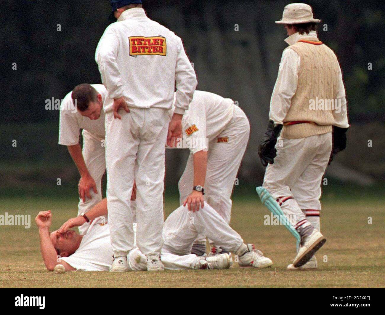 Robin Smith lies injured after taking a catch in the England Cricket ...