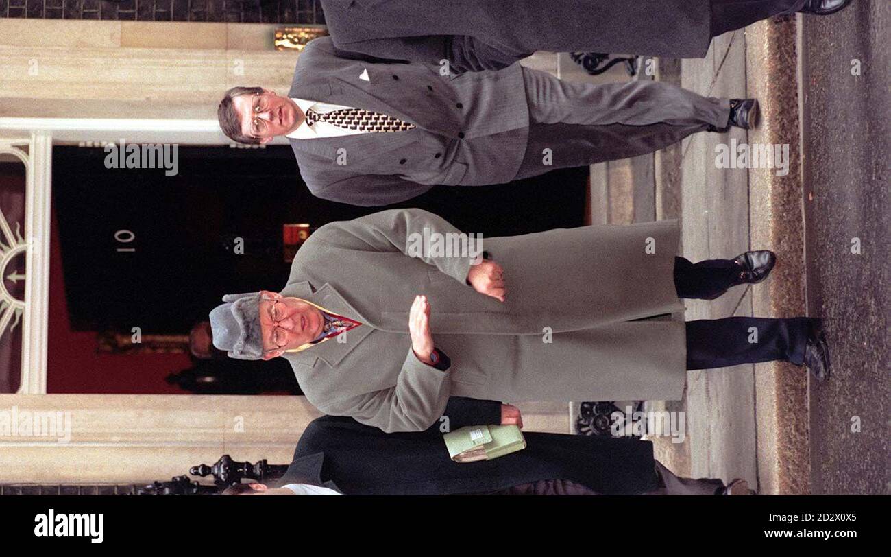 The Rev Ian Paisley (left) and fellow MP Peter Robinson leave Number 10 ...