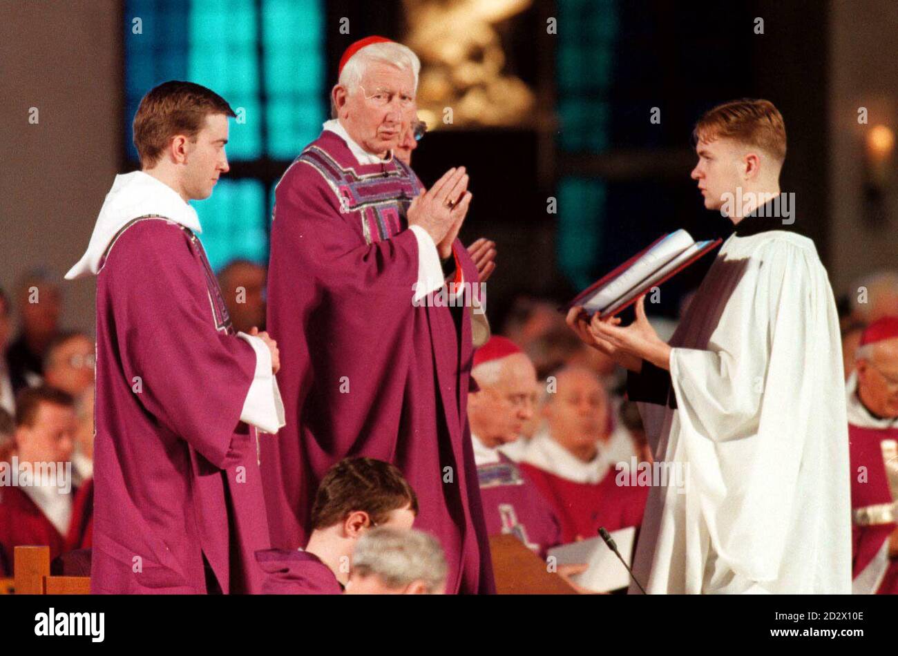 Cardinal Basil Hume officiates at the funeral of Archbishop Derek ...