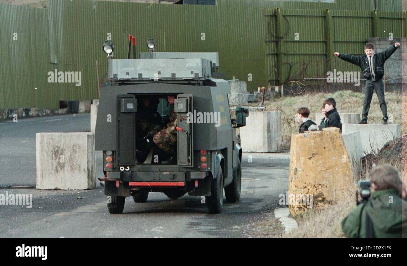 An Army vehicle patrol returns to Whiterock Army base, after patroling ...