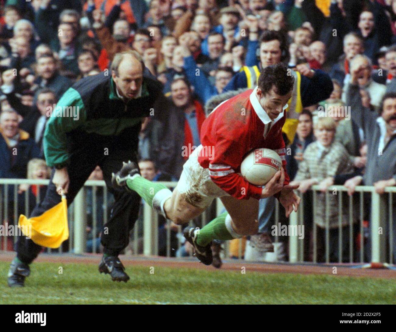Robert Howley goes over for Wales in the Five Nations Match against ...