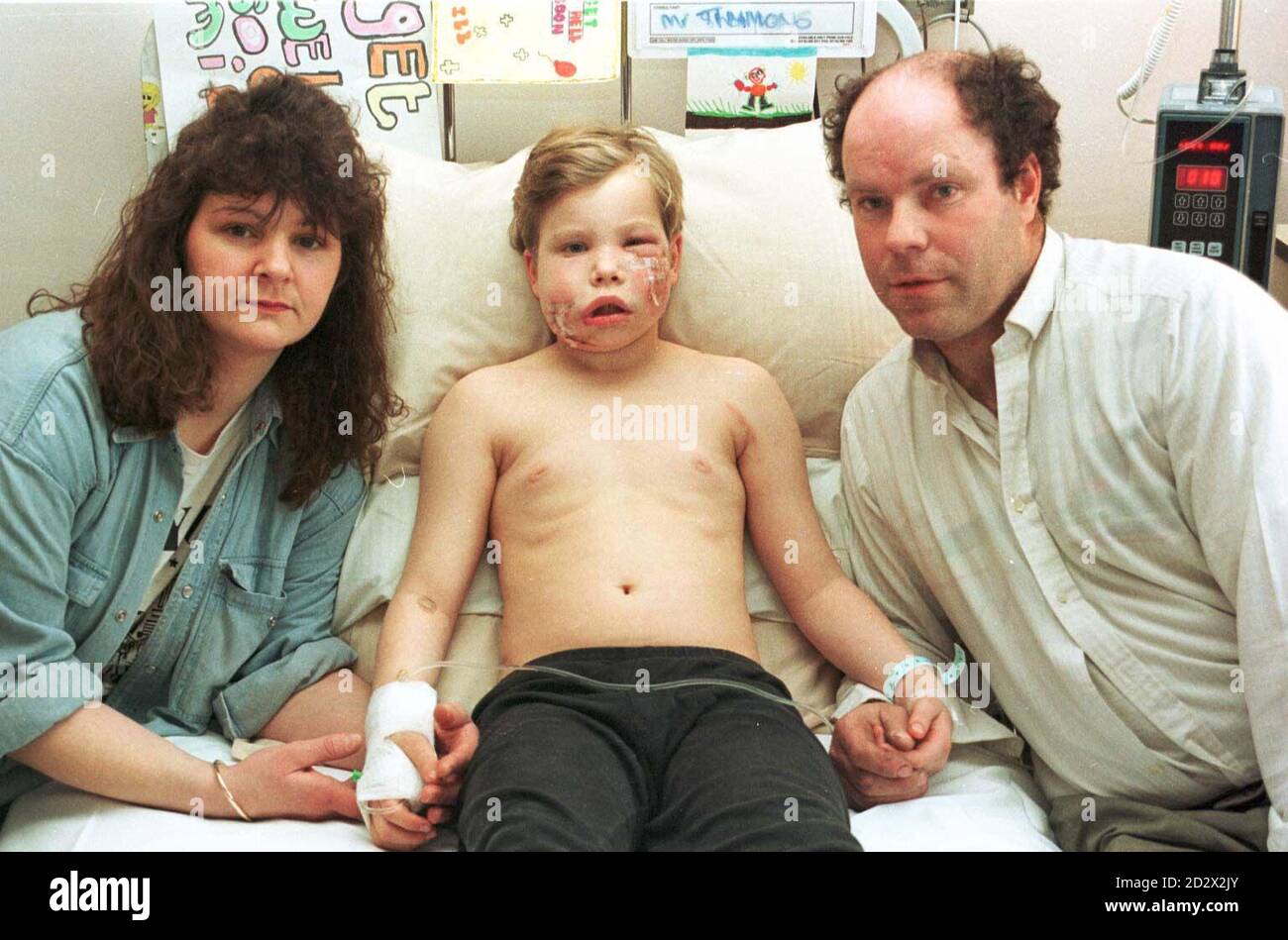 Eight-year-old Michael Swain with his parents Sonya and Graham ...