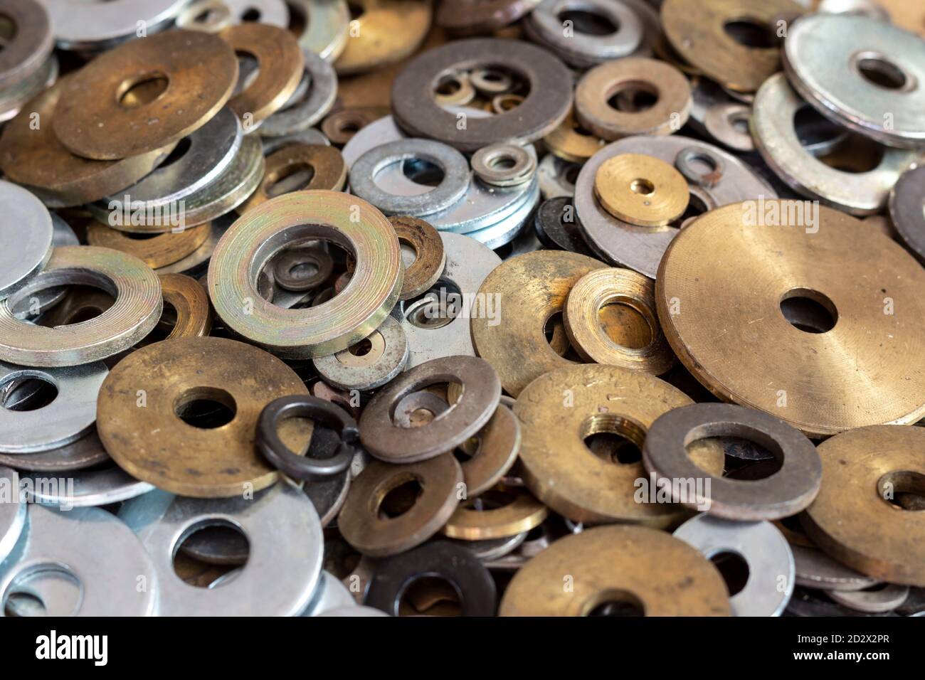 Steel and brass washers of various sizes and diameters Stock Photo - Alamy