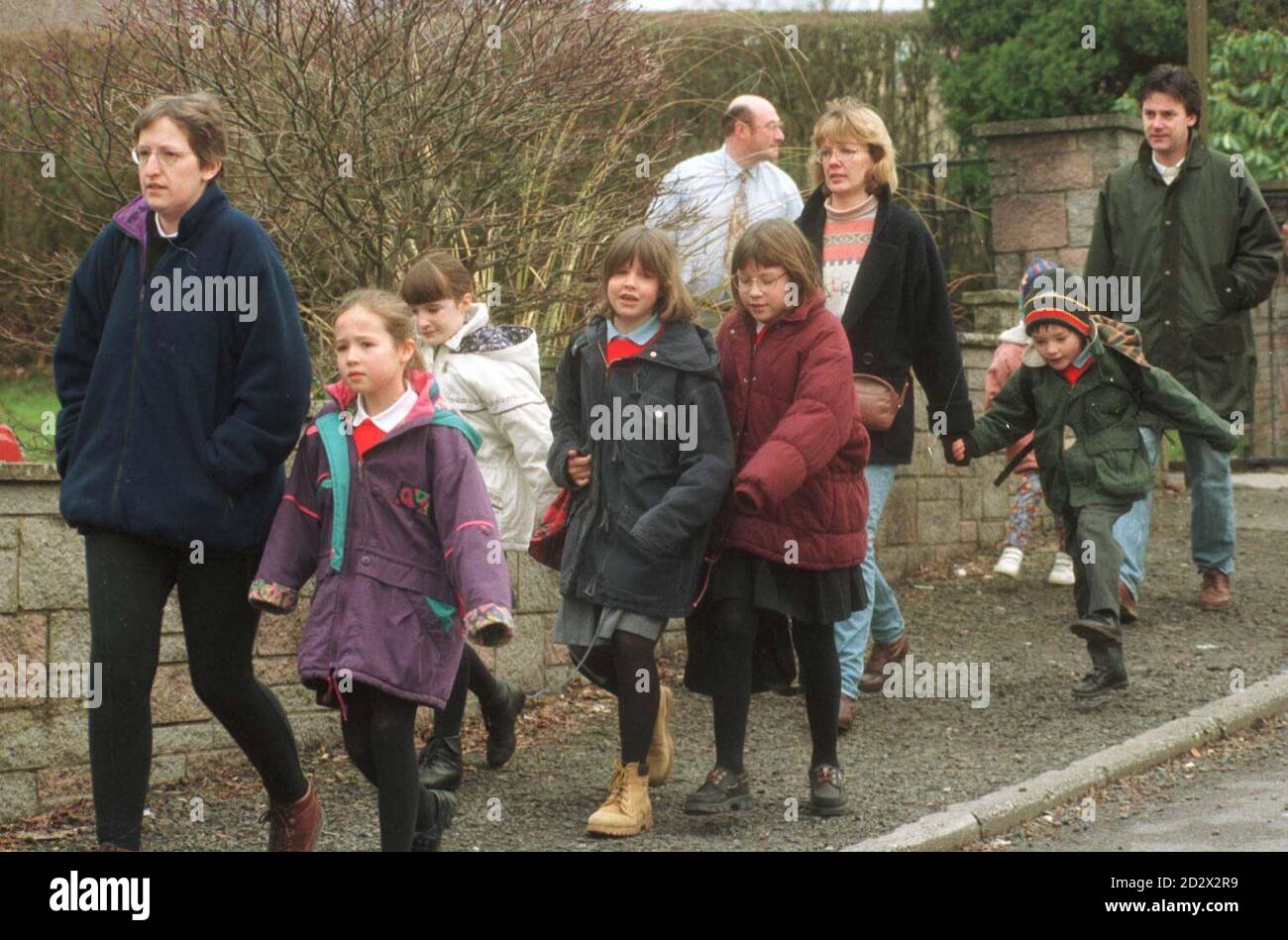 Children arrive back at Dunblane Primary School, their first day since ...