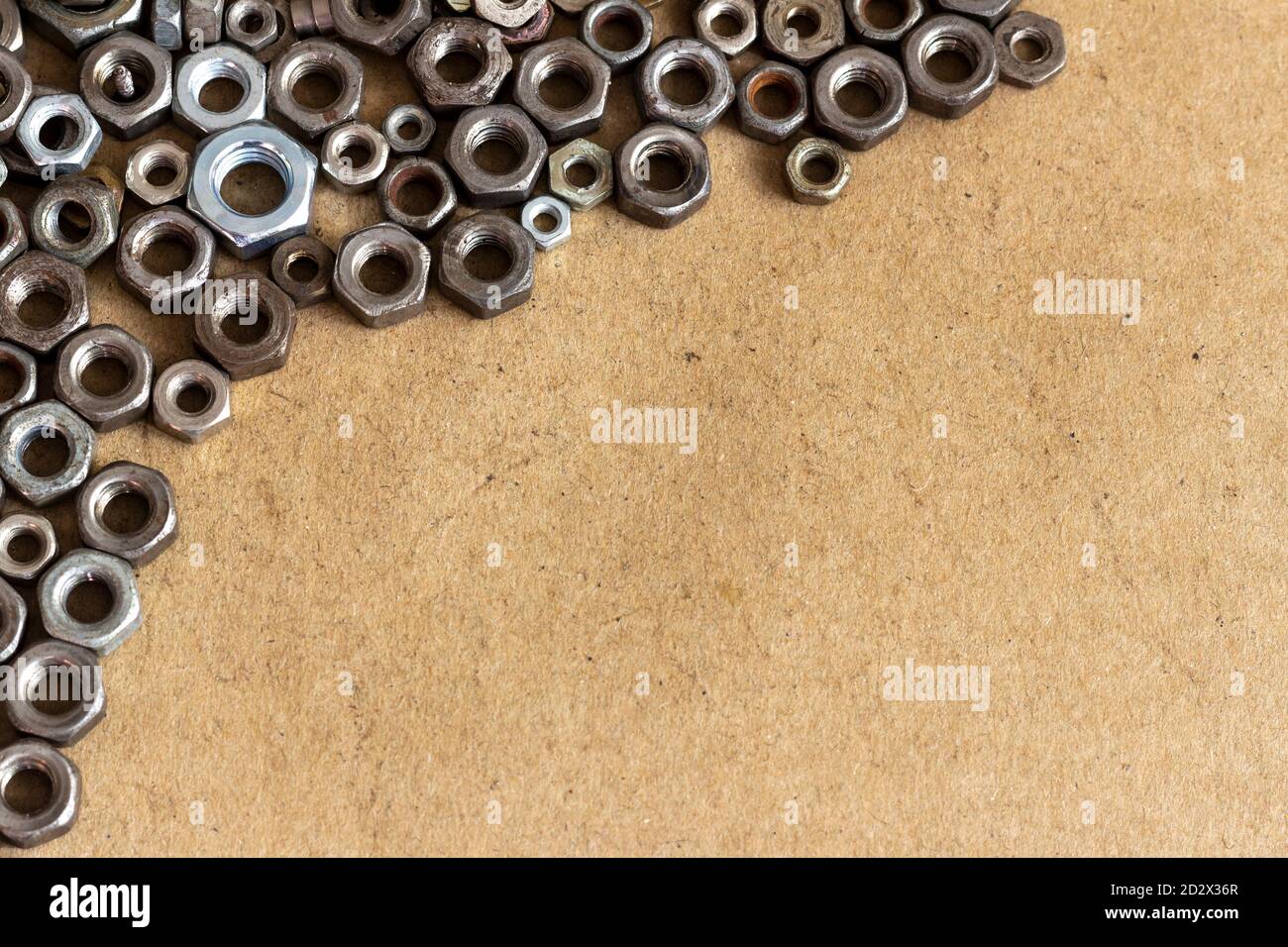 Rusty steel nuts of various sizes Stock Photo - Alamy