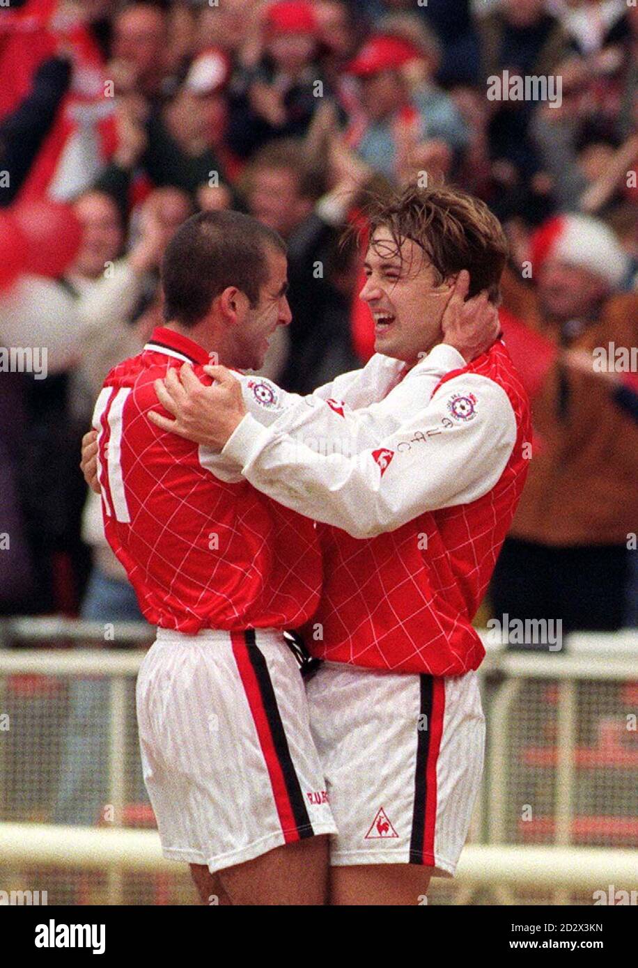 Rotherham United's Nigel Jemson (right) is congratulated by teammate ...