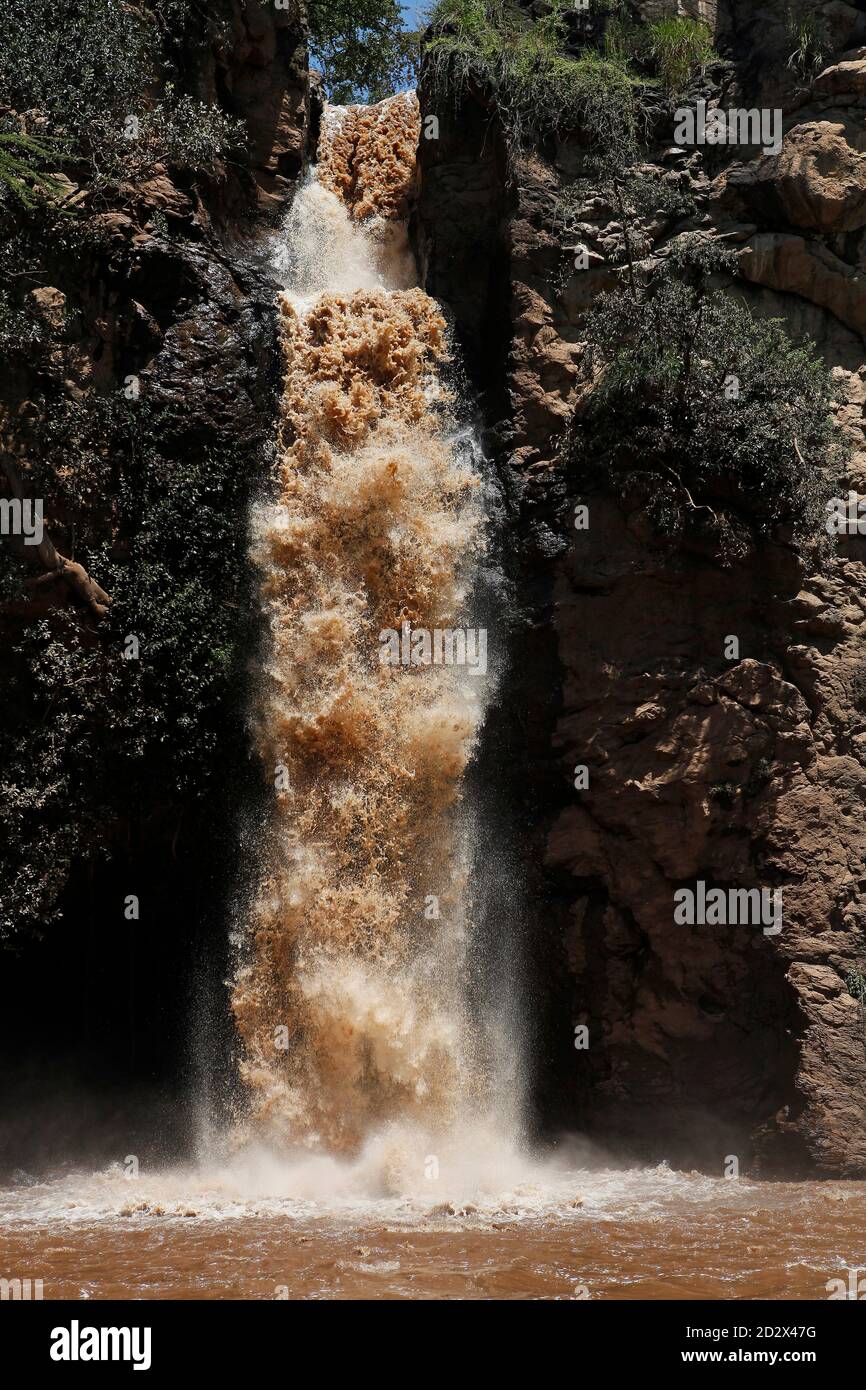 View of Waterfall, River draining into lake, Makalia Waterfall, Lake ...