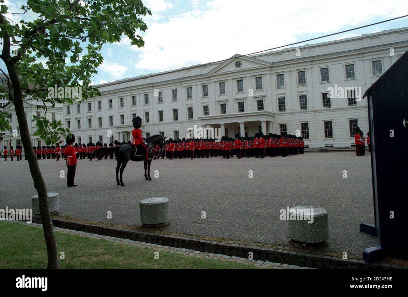Guardsmen line up outside Wellington Barracks during the first dress ...