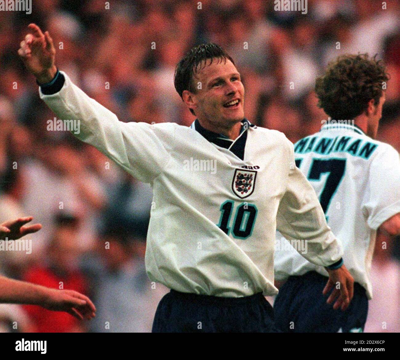 Teddy Sheringham celebrates scoring England's second goal in tonight's ...