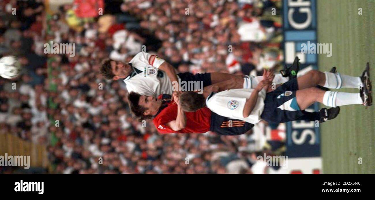 England captain Tony Adams leaps for a high ball in the opening seconds ...