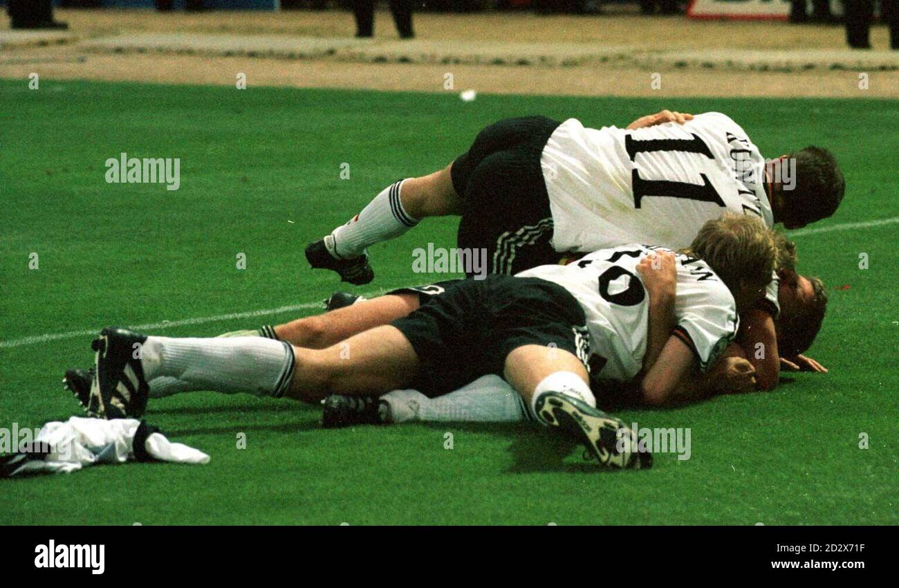 The German team celebrate their 2-1 victory over the Czech Republic in ...