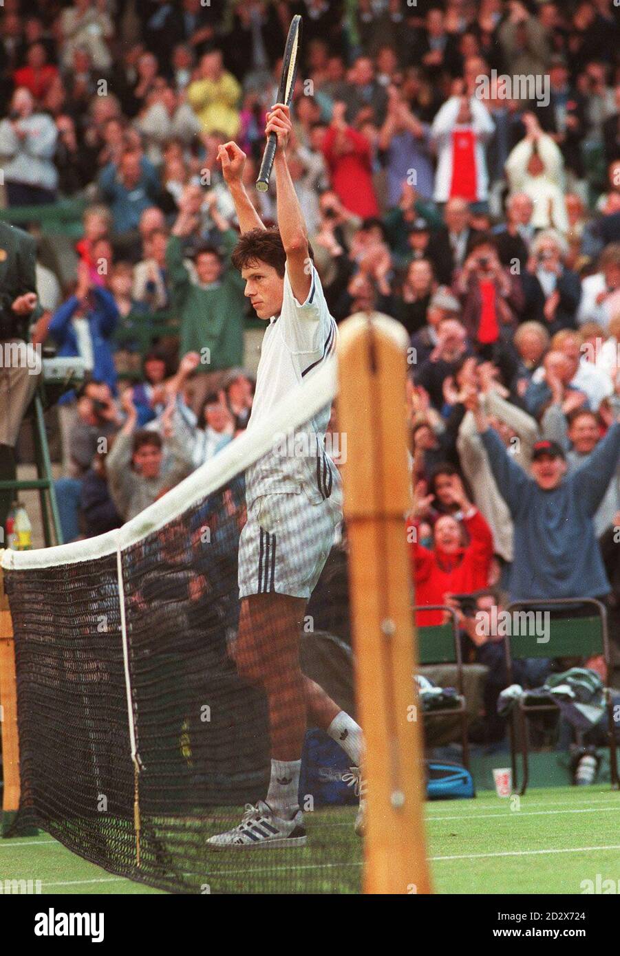 Fans celebrate with Britain's Tim Henman as he becomes the first ...