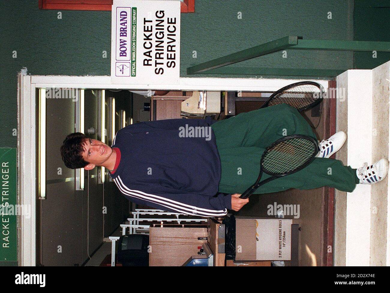 Tim Henman leaves the racket stringing service within the All England ...