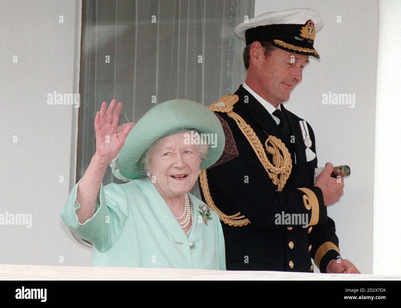 The Queen Mother with Royal Yacht Commodore Antony Morrow, Waves to the ...
