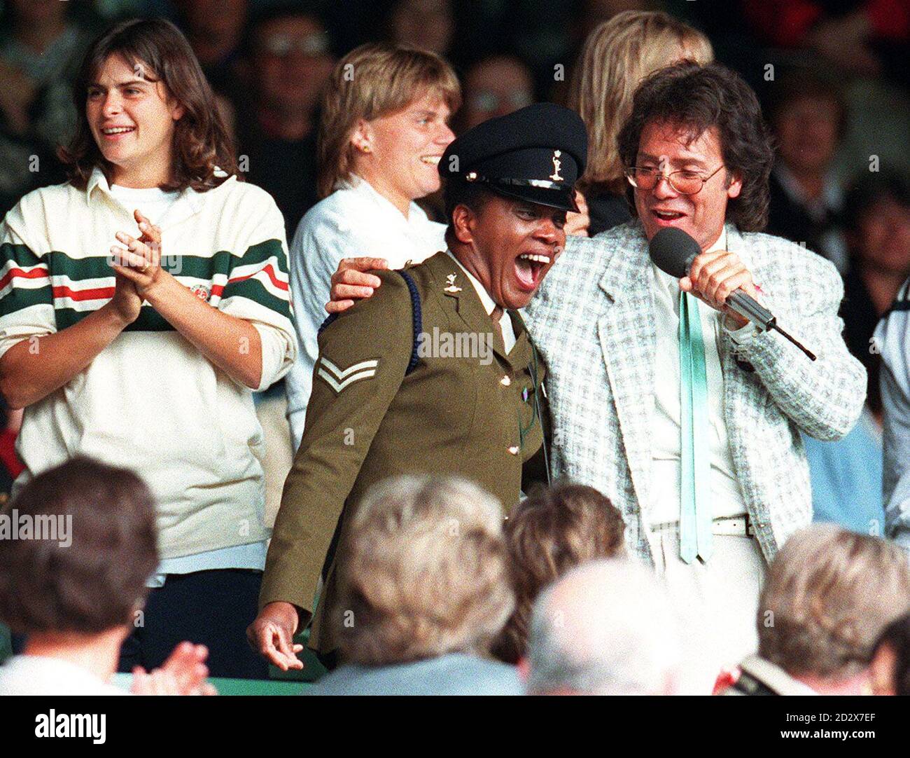Sir Cliff Richard dances with Corporal Lorna Ward on Centre Court this ...