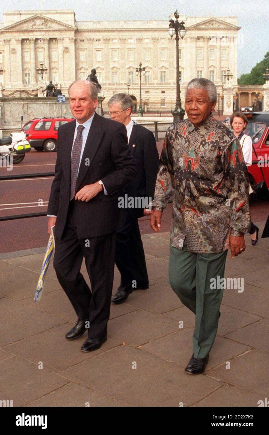 South Africa's President Nelson Mandela is accompanied by British High ...
