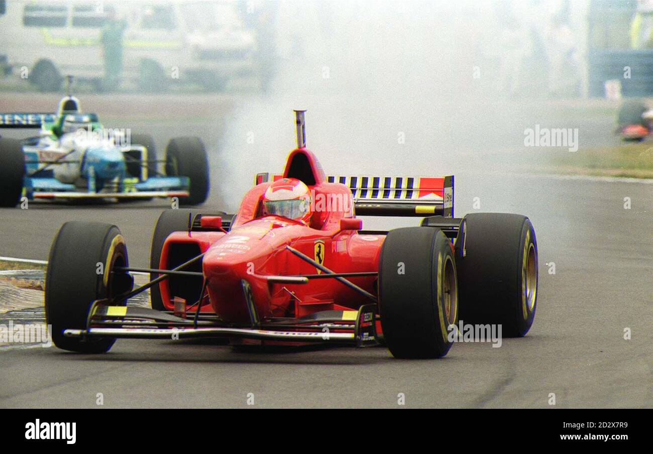 Smoke billows out back eddie irvines car hi-res stock photography and ...