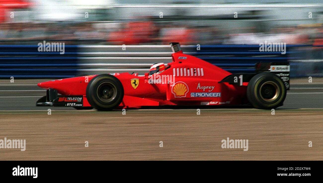 Germany's Michael Schumacher speeds past the Copse corner during open ...