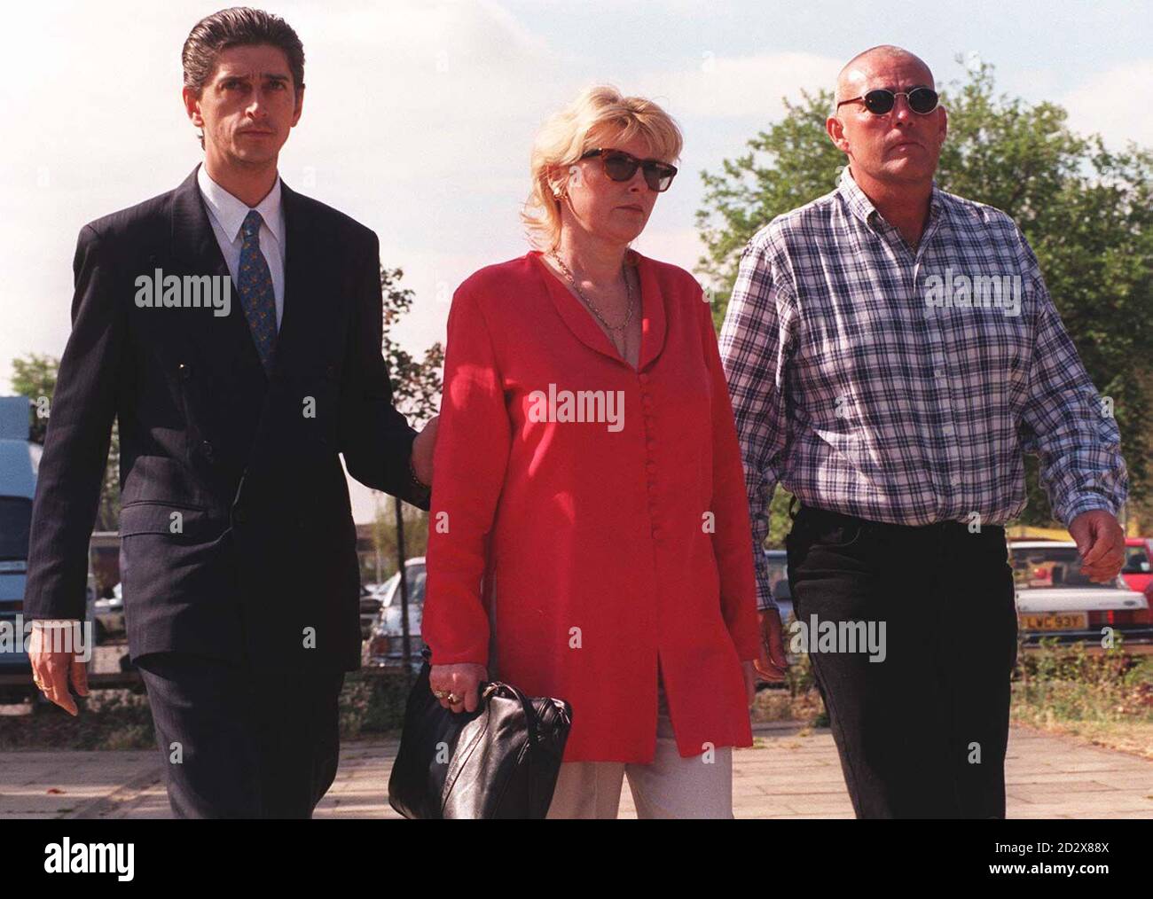 The fiancee of Charlie Kray, Judy Stanley, accompanied by two ...