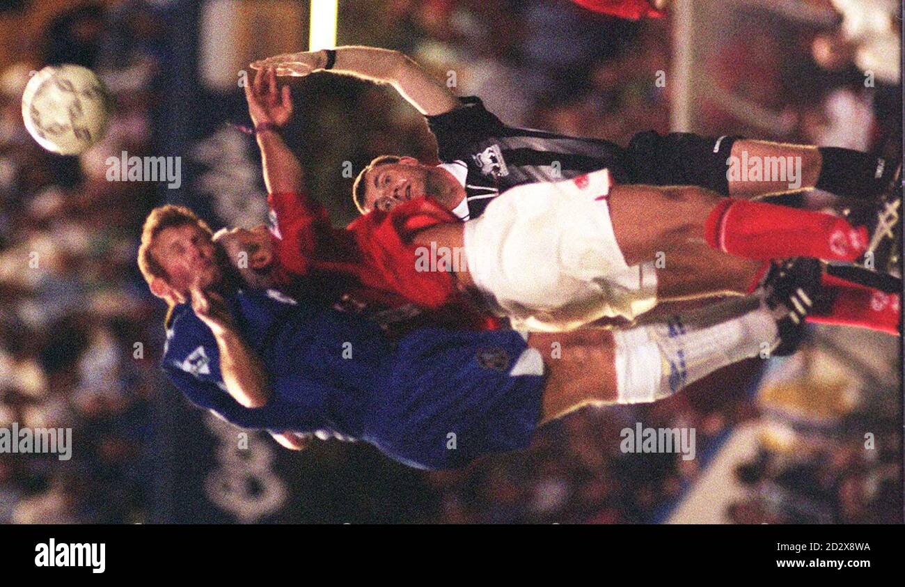 Middlesbrough's Fabrizio Ravanelli in a mid-air clash with Chelsea's ...