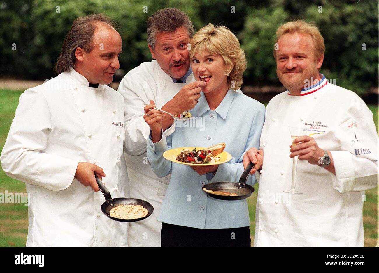 TV presenter Anthea Turner tries one of the delicious dishes prepared ...