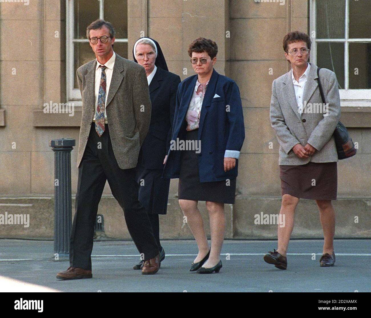 Bernard and Martine Figard (dark blue coat) arrive at Worcester Crown ...