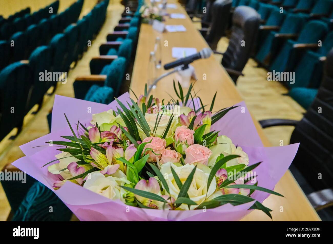 Place for judges at the music hall. A long jury table in an empty ...