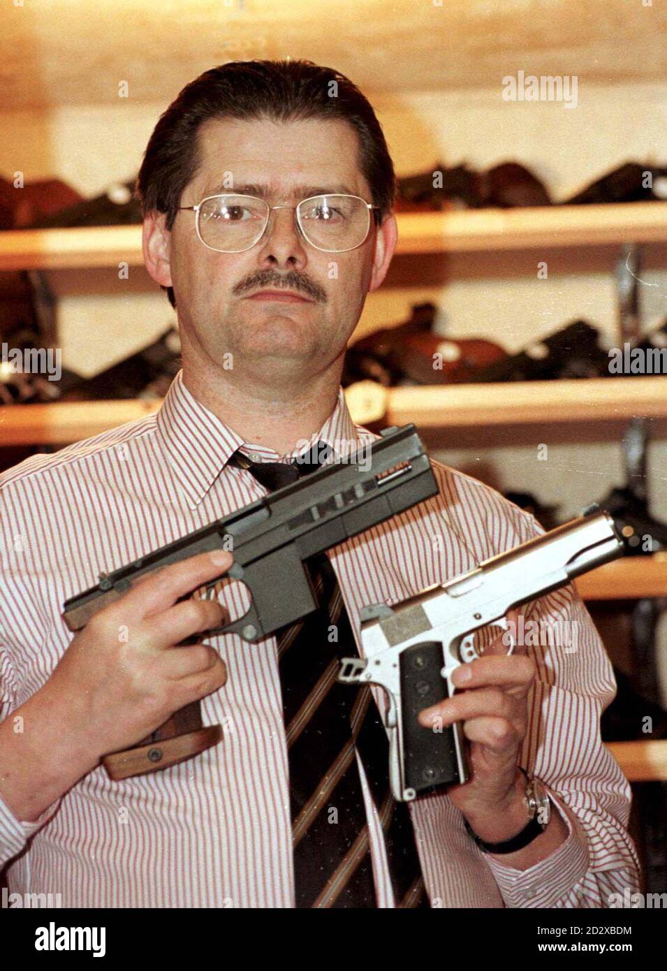 Roger Francis, owner of South Yorkshire Shooting Supplies, holding a ...