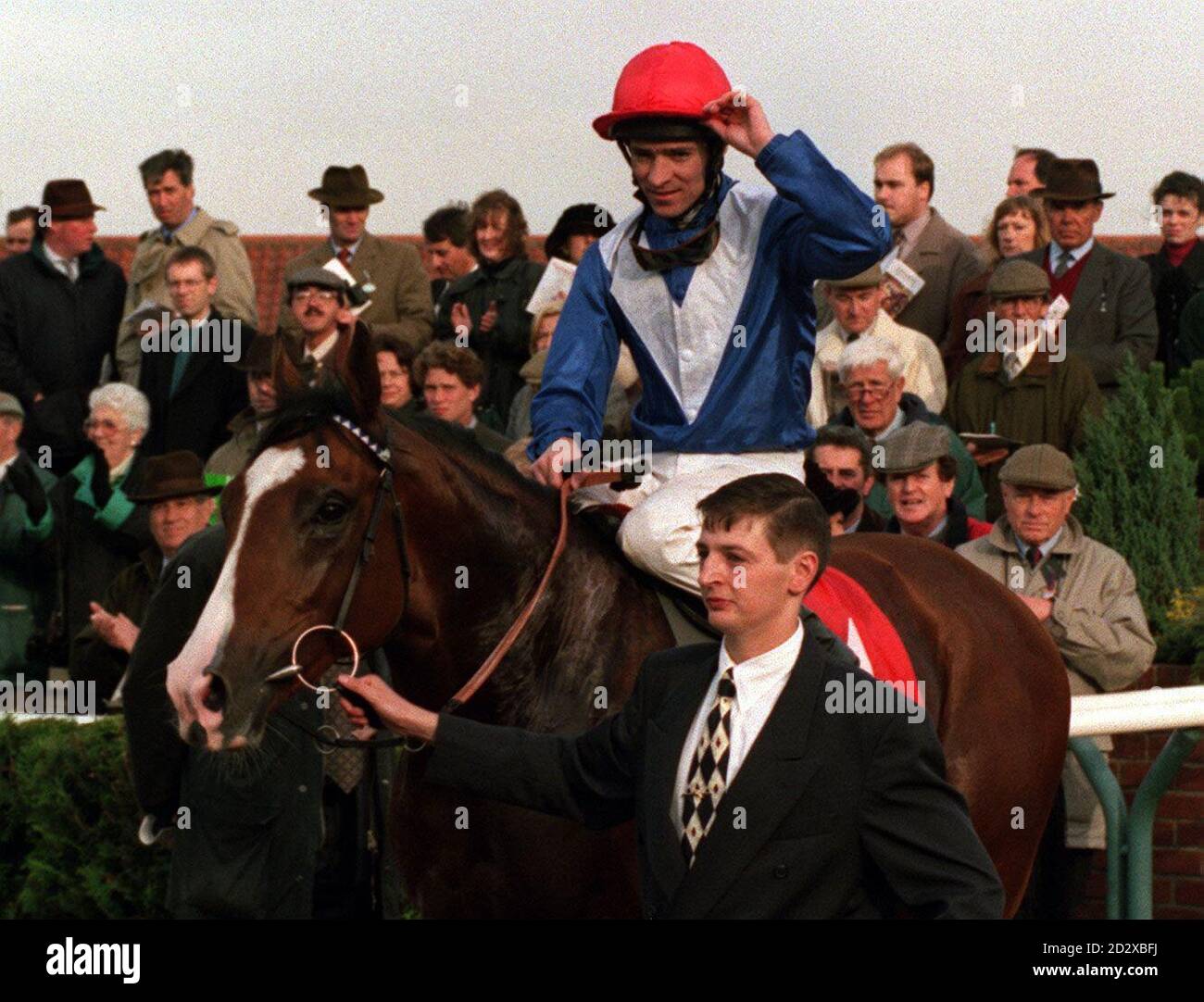 Michael Hills riding In Command enters the winning enclosure, after ...
