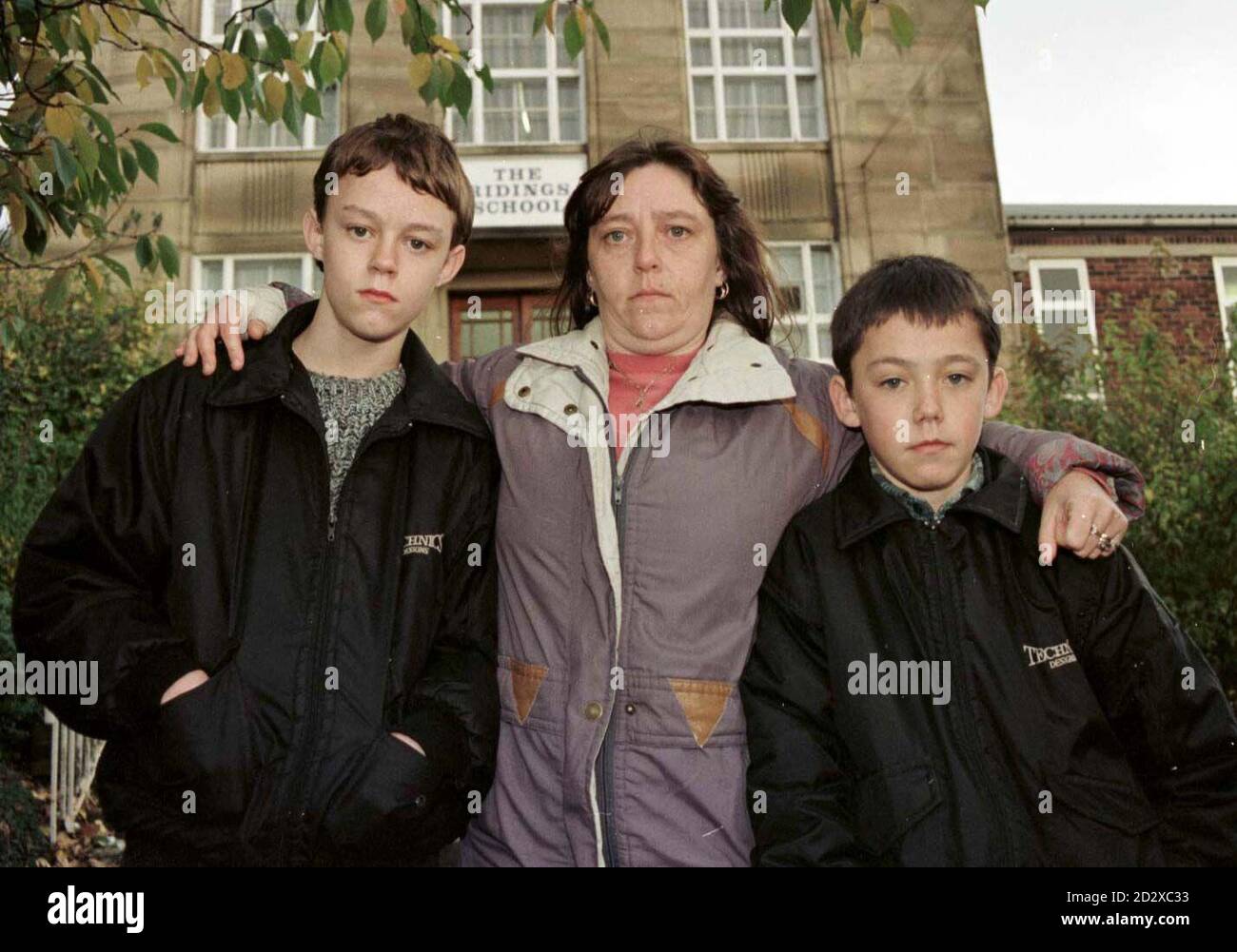 Steven (left), 15, and Dennis, 13, Roose, with their mother Linda ...