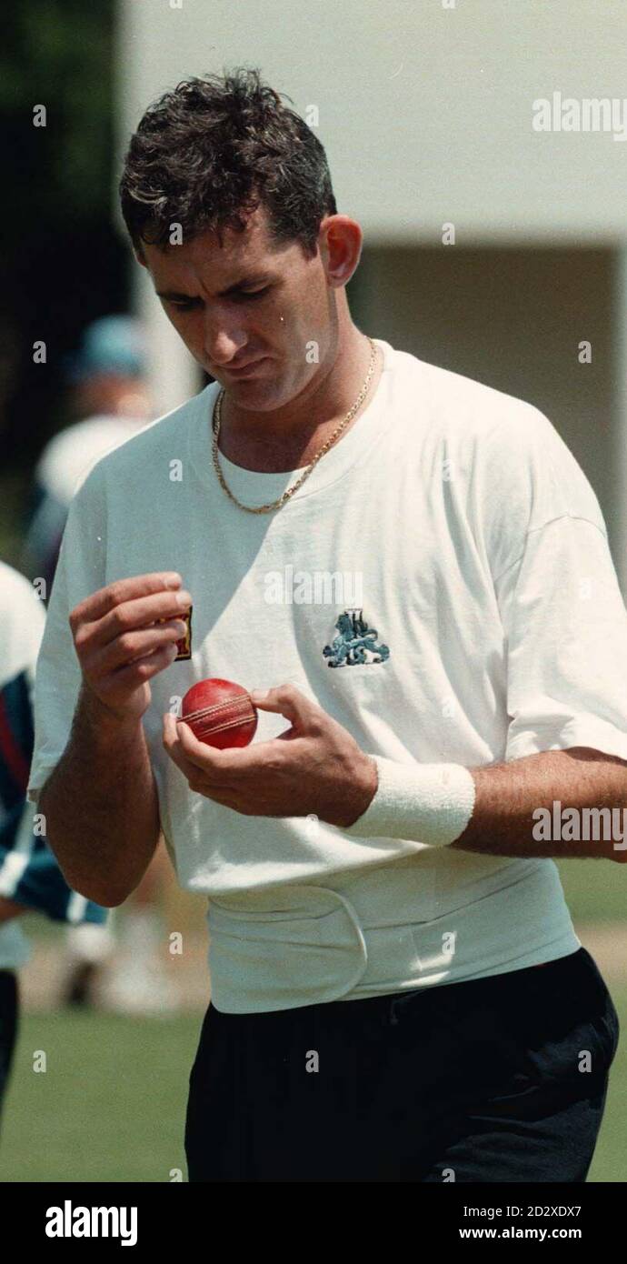 England bowler Andrew Caddick wears a corset during net practice, for ...