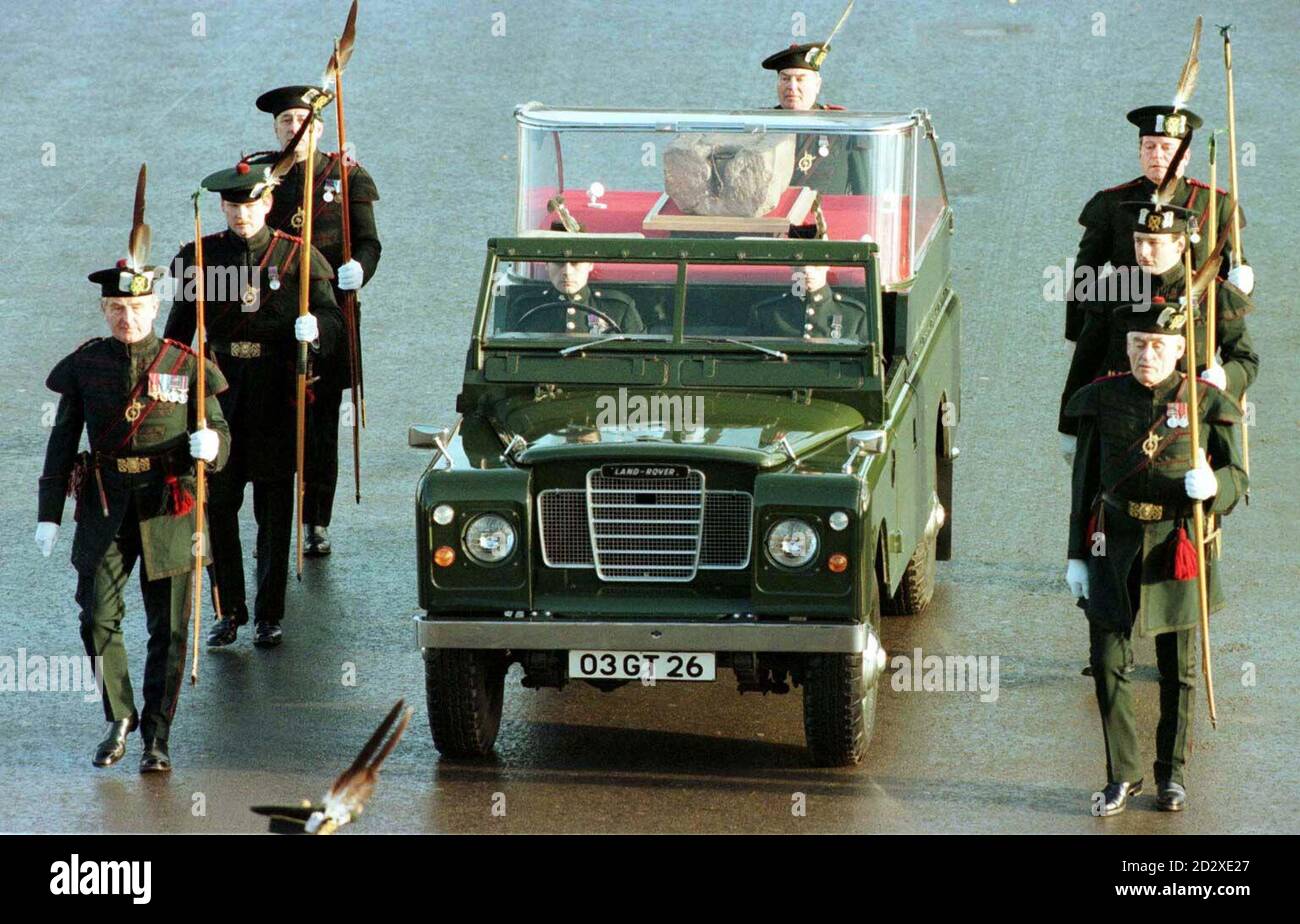 Members of the Royal Archers,escort the Army Land Rover carrying the ...