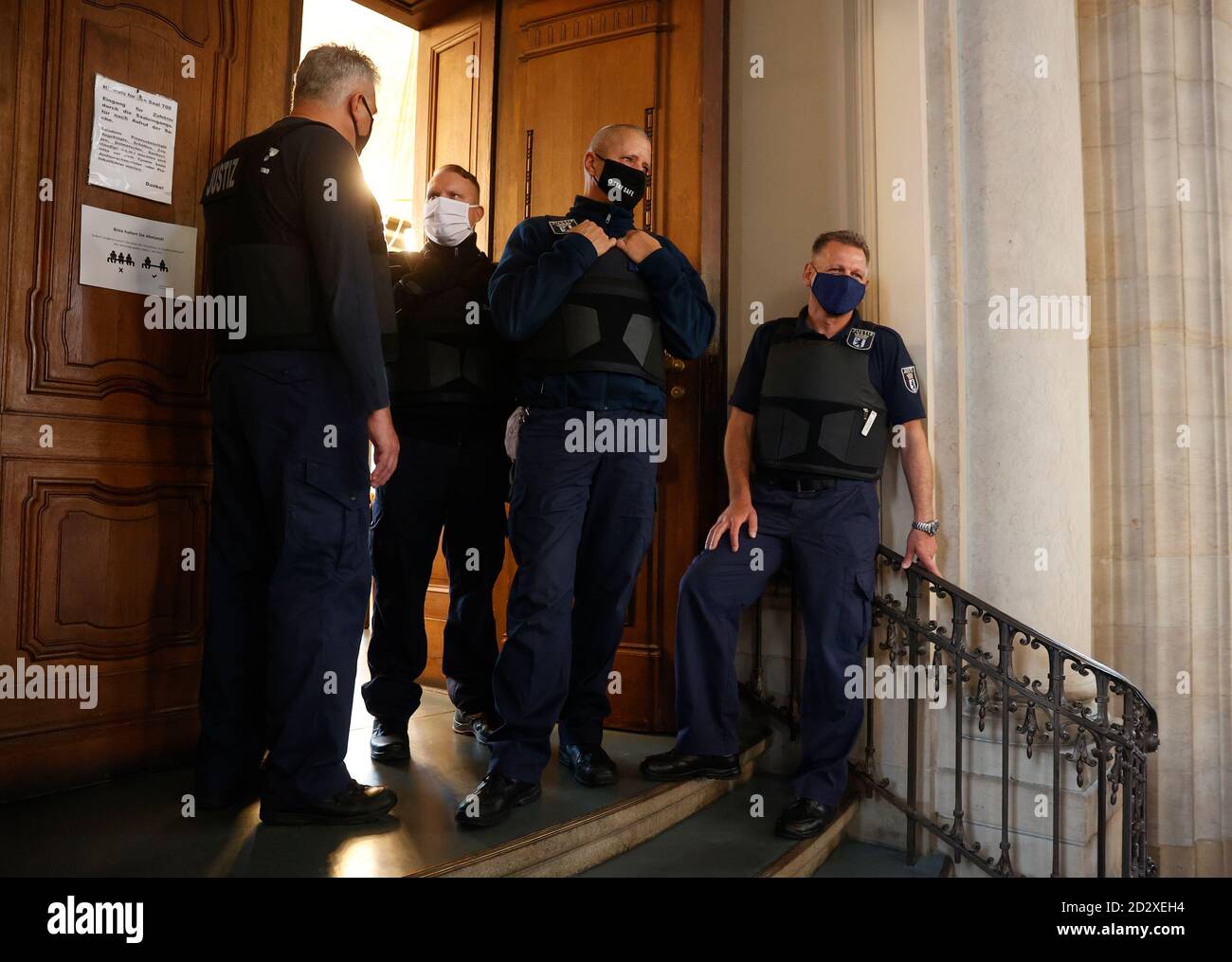 Berlin, Germany. 07th Oct, 2020. Police officers guard the entrance to ...