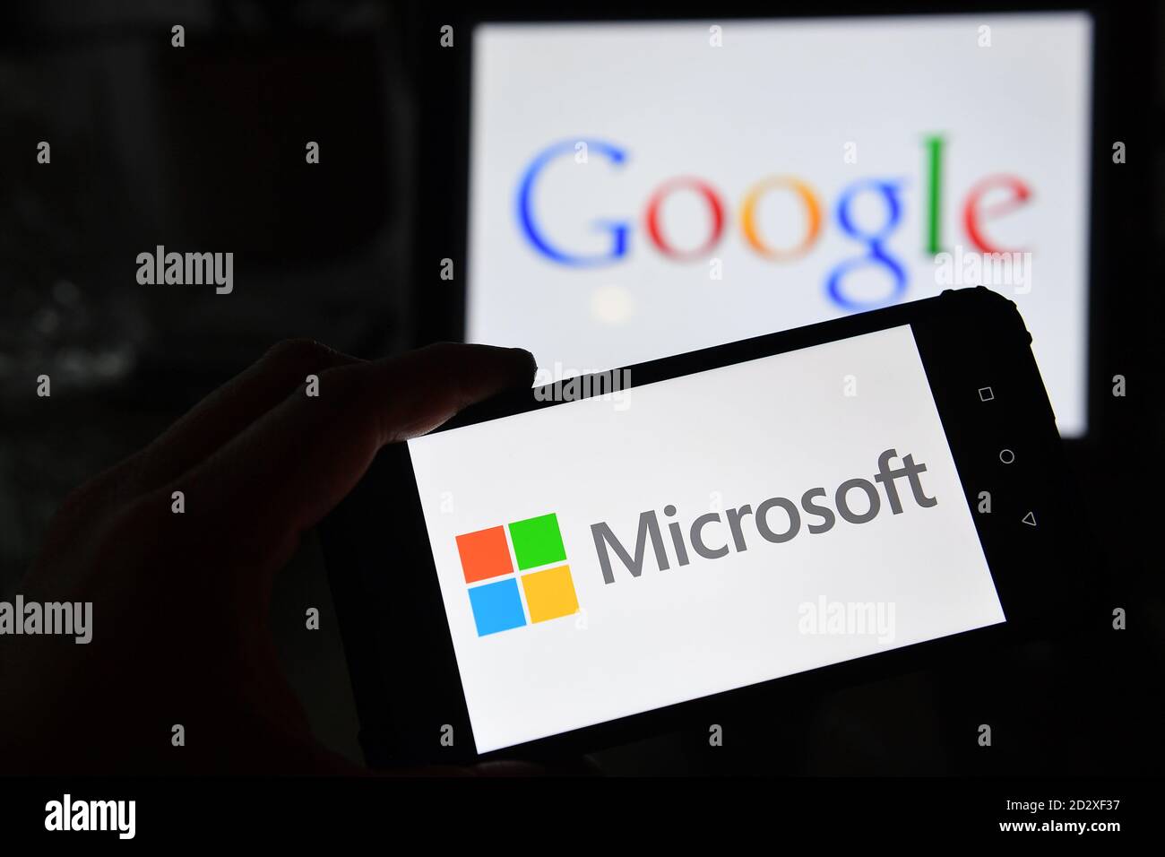 Microsoft and Google logos displayed on screens in London, UK Stock ...