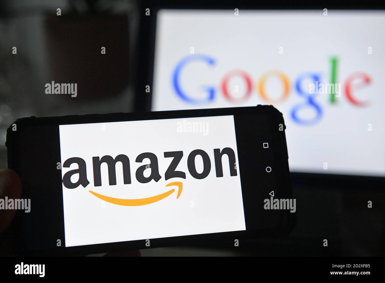 Amazon and Google logos displayed on screens in London, UK Stock Photo ...
