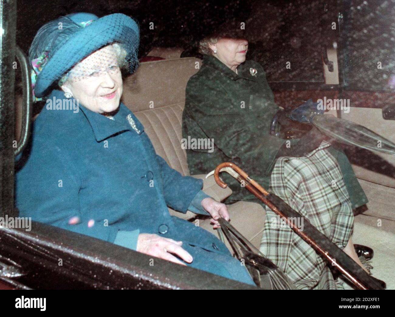 Queen mother enter sandringham church driveway on way hi-res stock ...