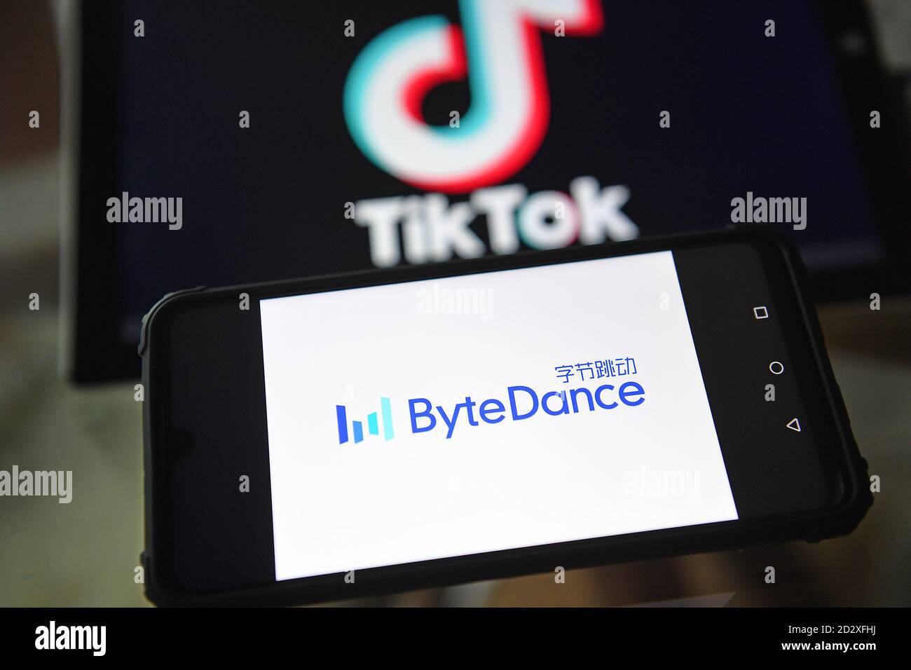 TikTok and ByteDance logos displayed on screens in London, UK Stock ...