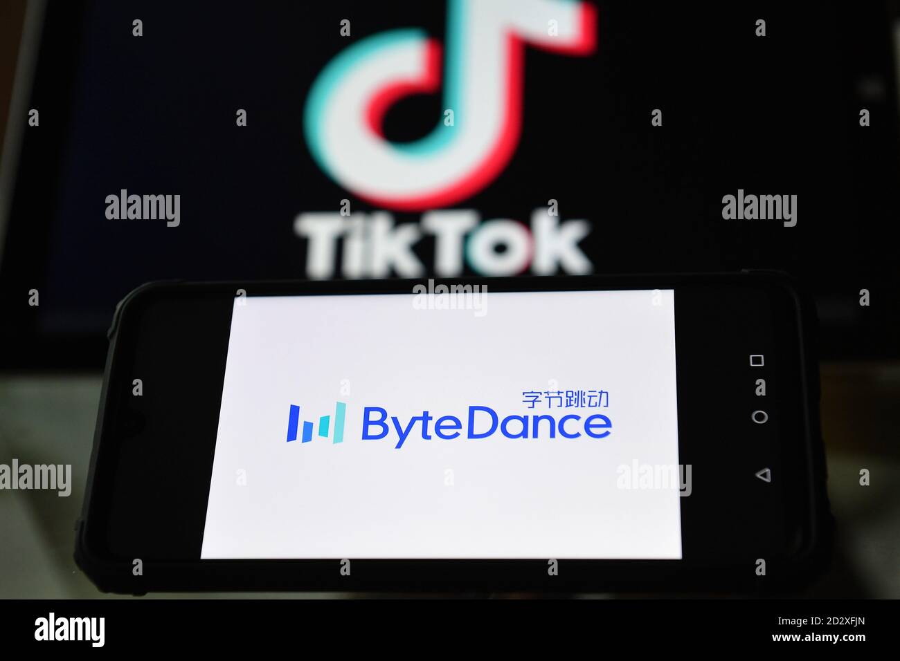 TikTok and ByteDance logos displayed on screens in London, UK Stock ...