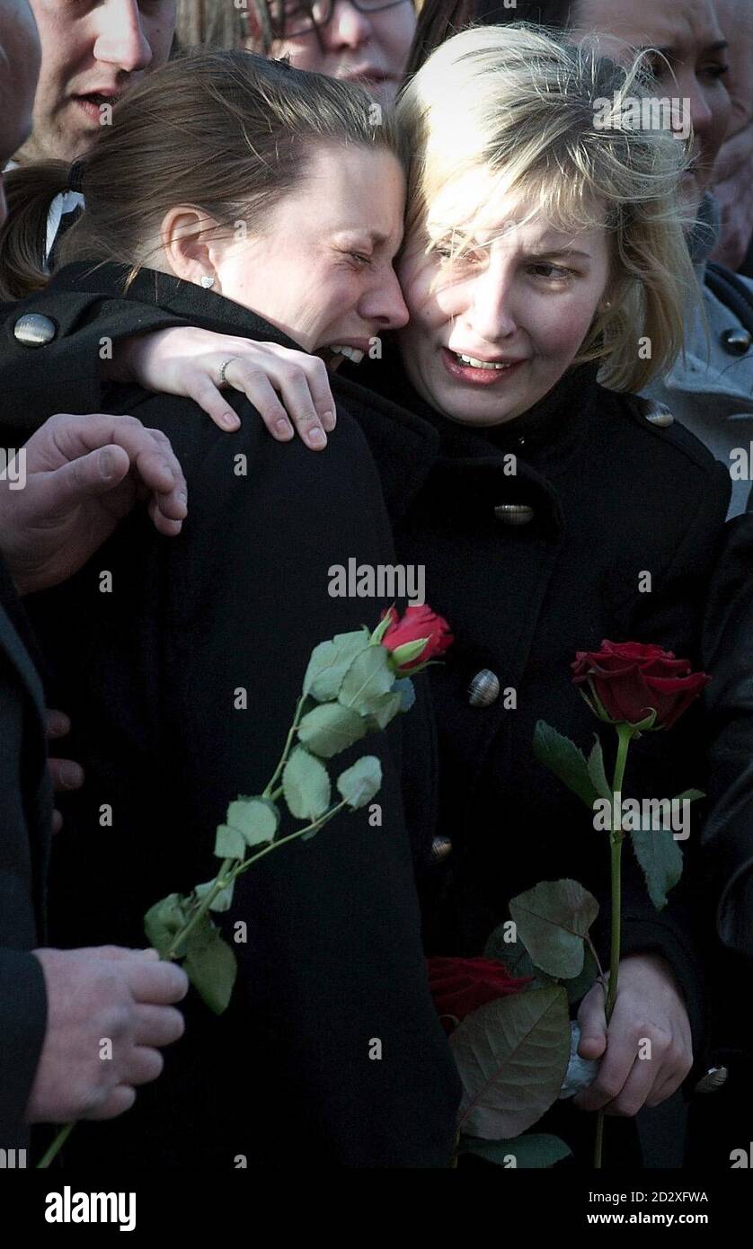 NOTE ALTERNATE CROP: Laura Tasker (right), the sister of Lance Corporal ...