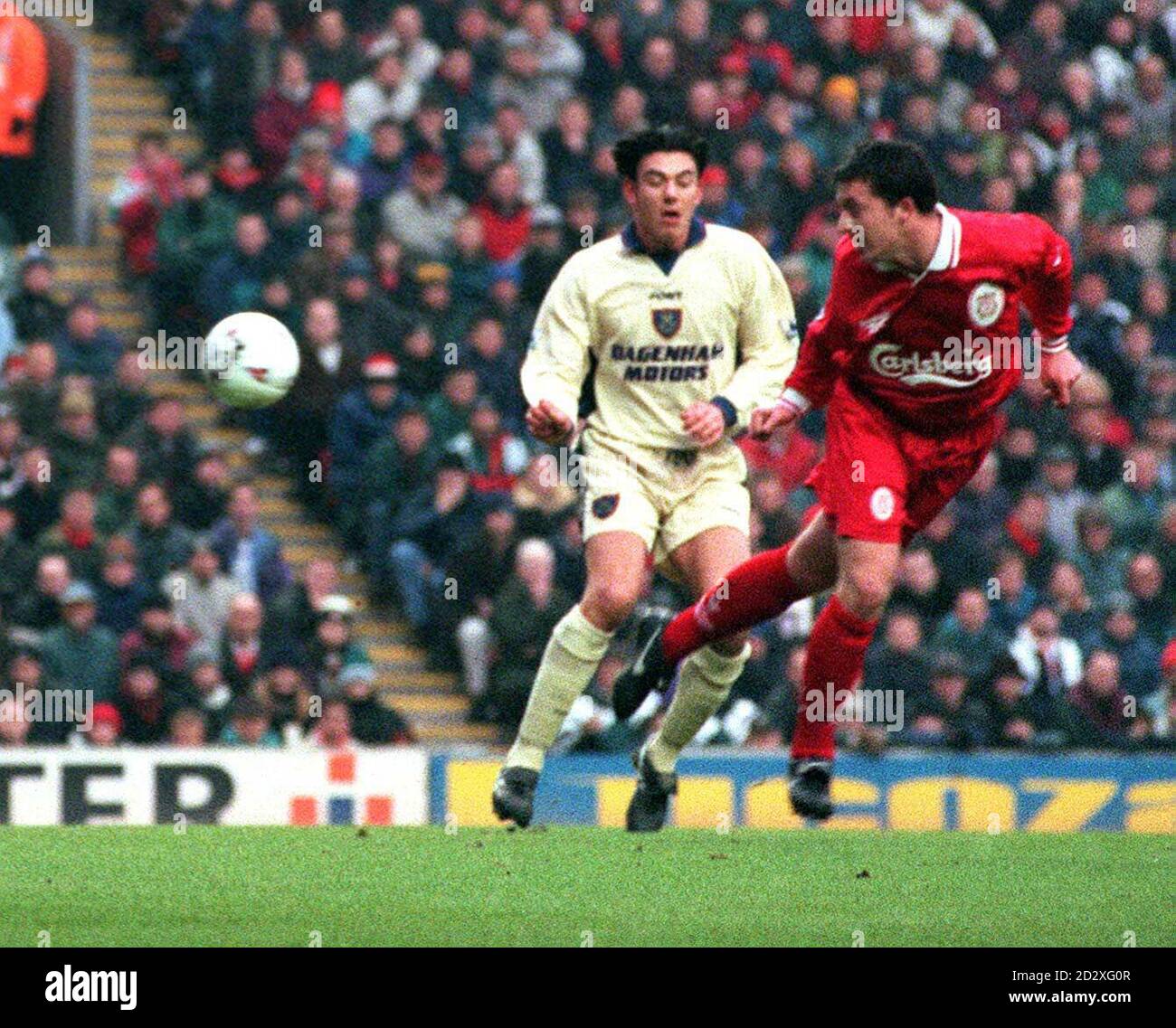 Liverpools robbie fowler heads ball hi-res stock photography and images ...