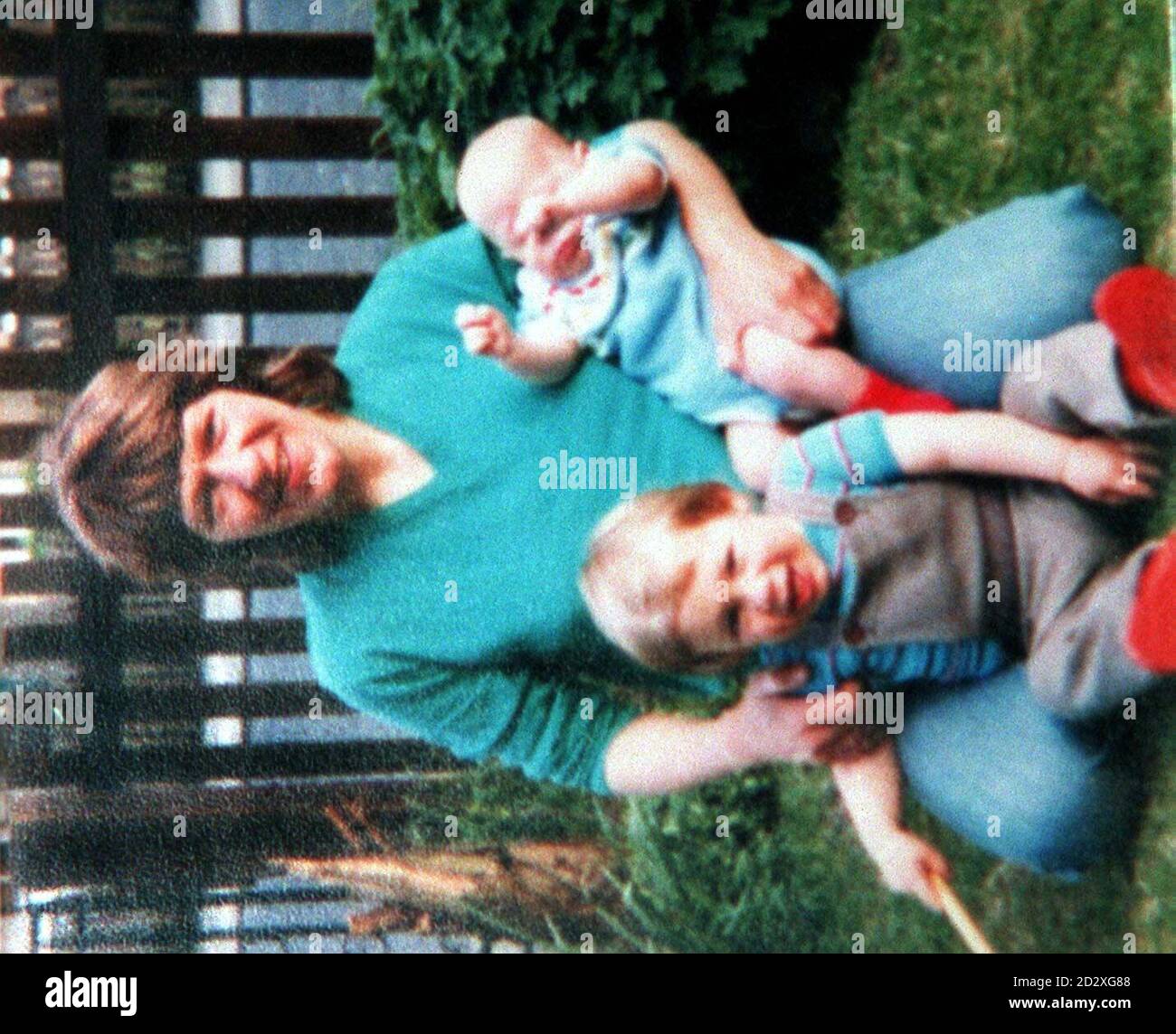 Undated filer of Eve Howells with sons Glenn (left) and John in a ...