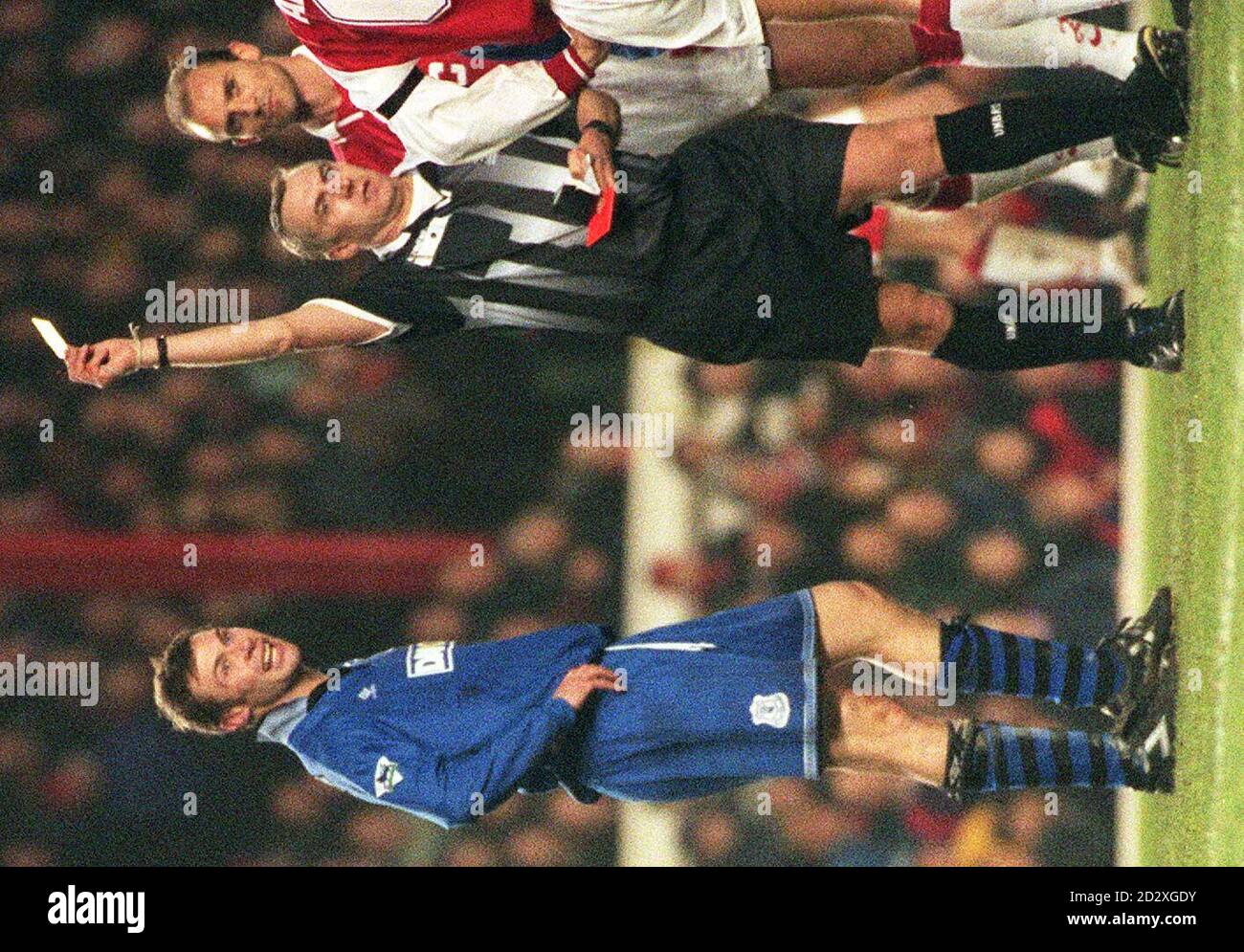 Referee keith burge shows yellow card hi-res stock photography and ...