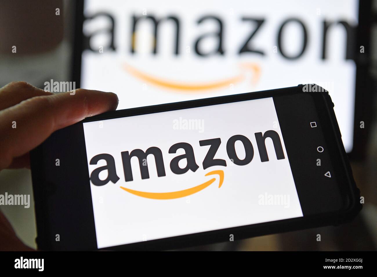 Amazon logos displayed on screens in London, UK Stock Photo - Alamy