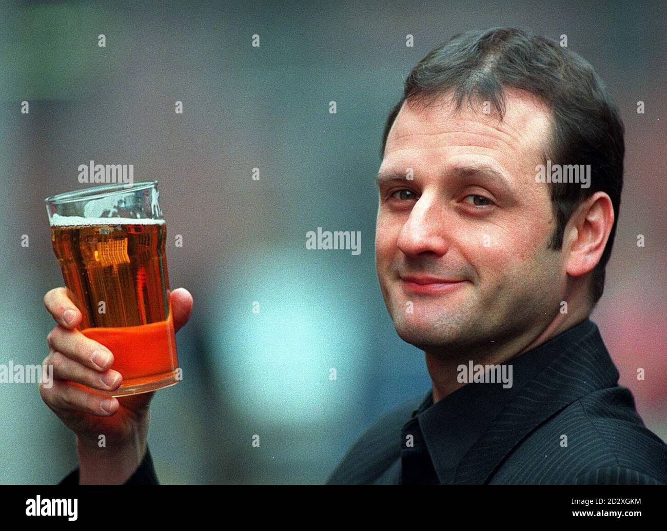 New Radio One Breakfast Show presenter Mark Radcliffe (left) celebrates ...
