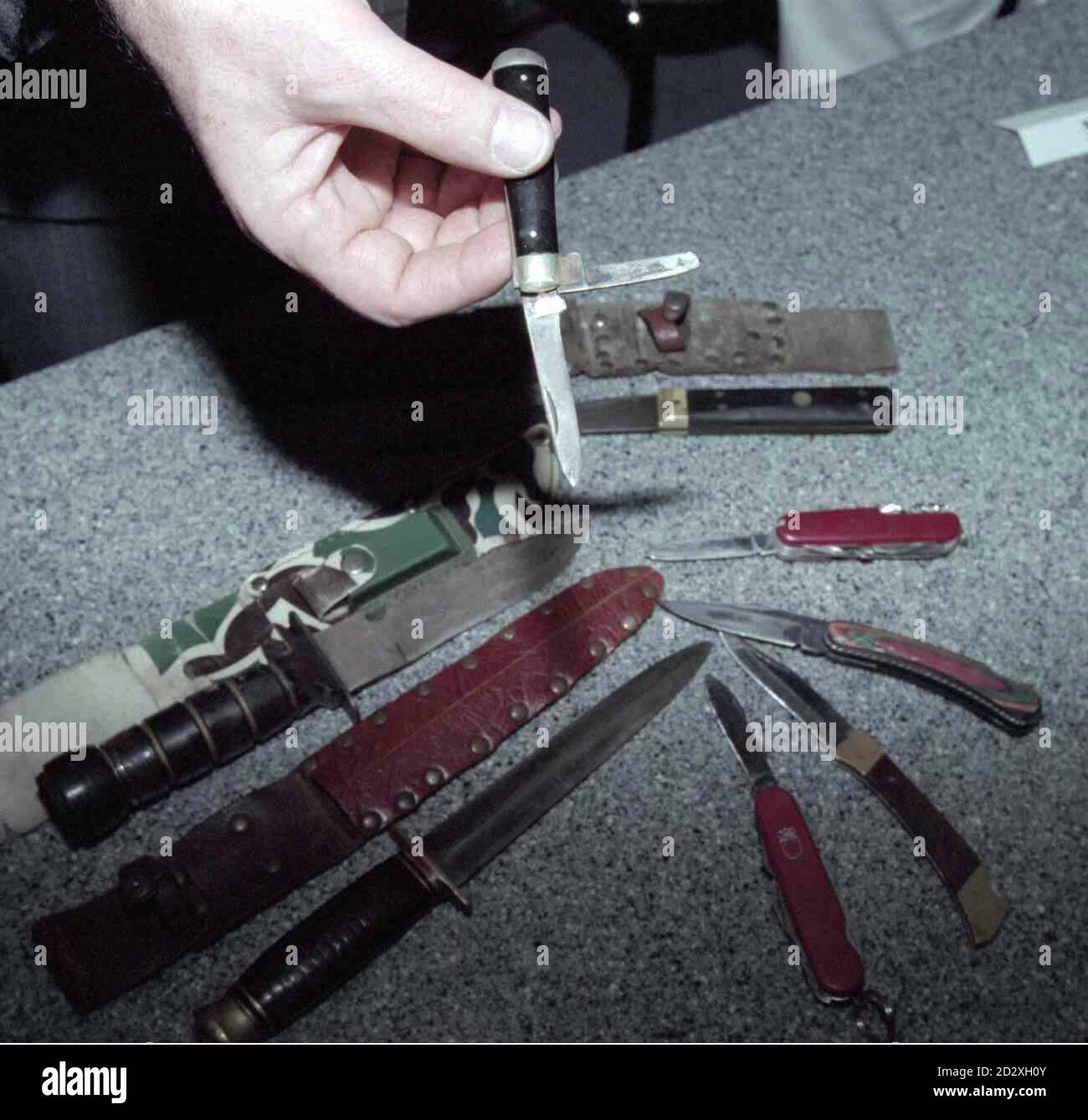 The collection of knives - including (being held) what is believed to ...