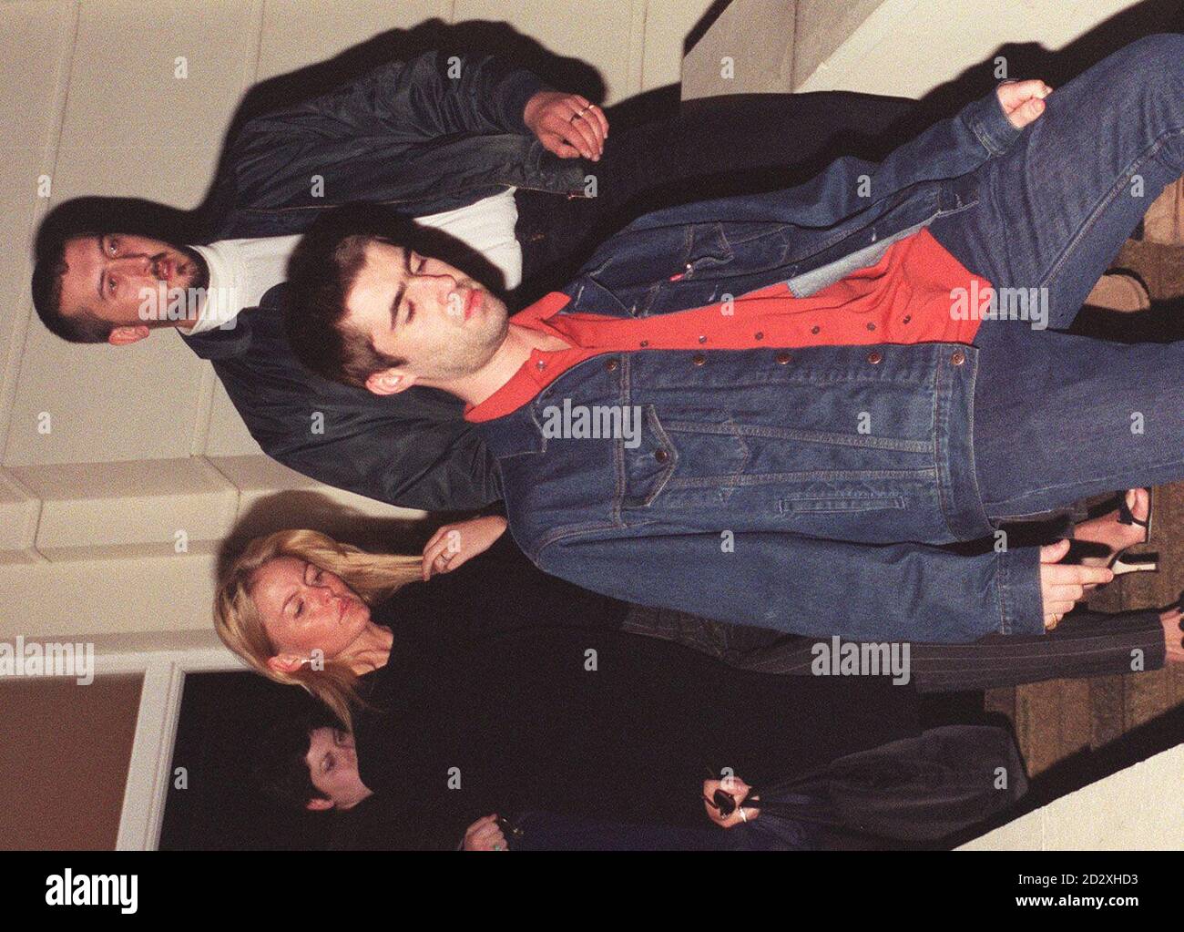 Oasis singer Liam Gallagher and girlfriend Patsy Kensit leave their ...