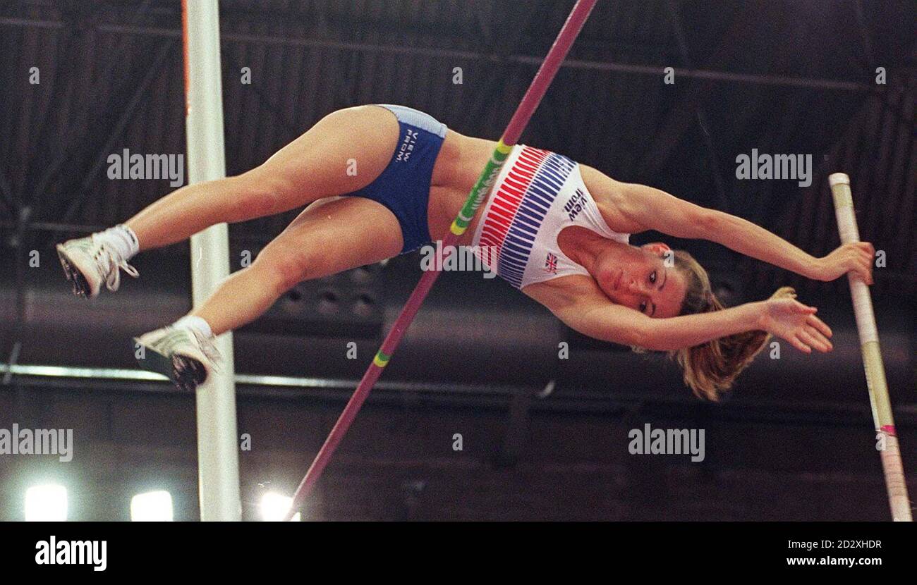 Welsh record holder Rhian Clarke clears the bar in the Women's Pole Vault at the World Indoor ...