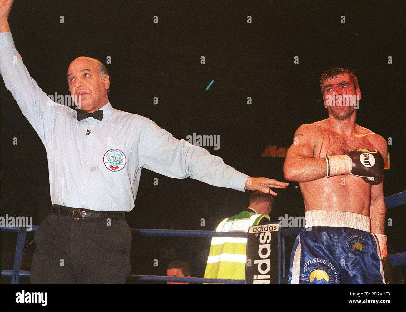 Referee Joe Cortez halts the bid by challenger Frederic Seillier for ...